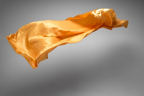 Golden flying fabric Stock Photo by ©yurok.a 94148826