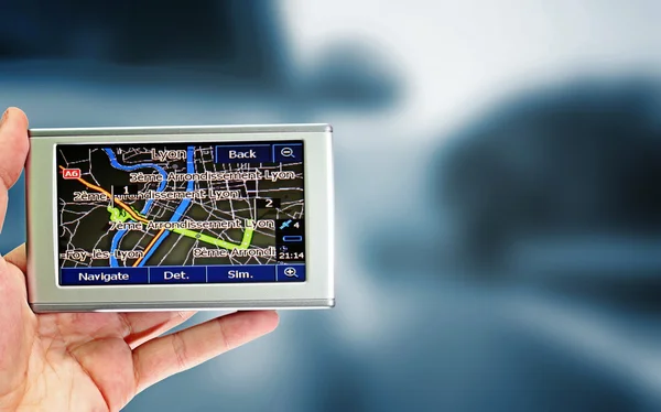 Gps in a man hand. - Stock Image - Everypixel