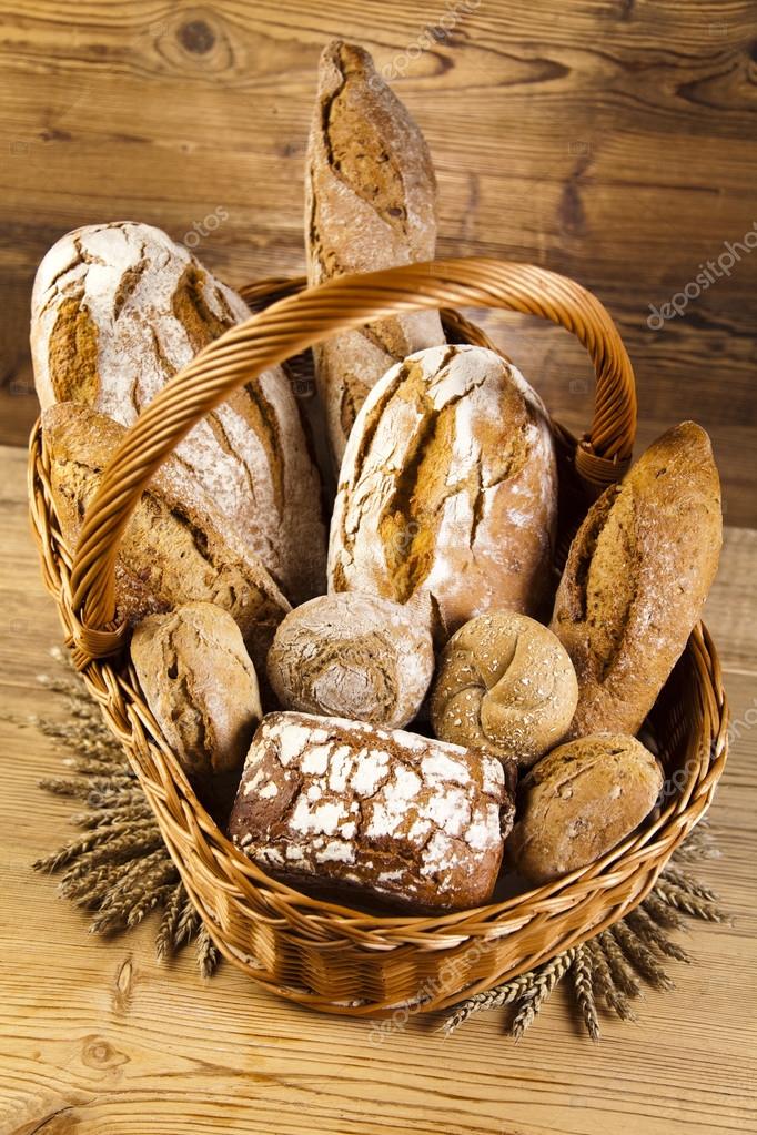 Traditional bread in basket Stock Photo by ©JanPietruszka 52088081
