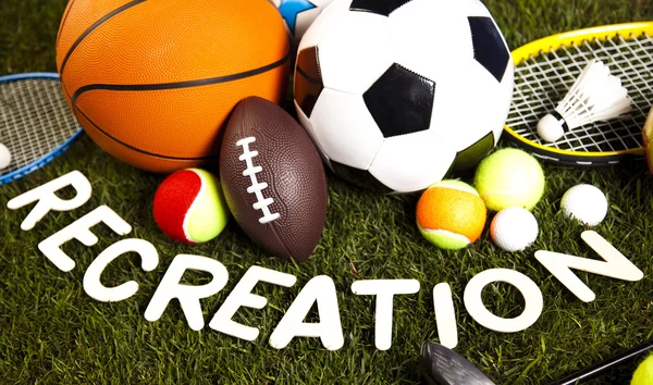 Recreation word with sports equipment — Stock Photo © JanPietruszka ...