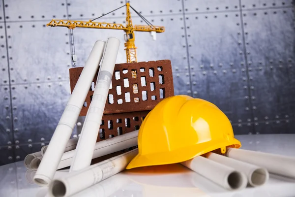 Crane, Safety helmet, Blueprints and construction site Stock Photo by ...