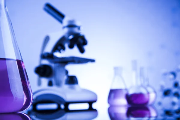 Microscope and glassware in laboratory Stock Photo by ©JanPietruszka ...