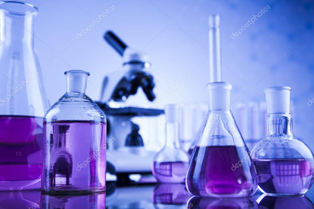 Microscope and glassware in laboratory — Stock Photo © JanPietruszka ...