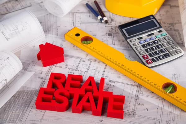 Real estate with house model and achitectural drawing - Stock Image ...