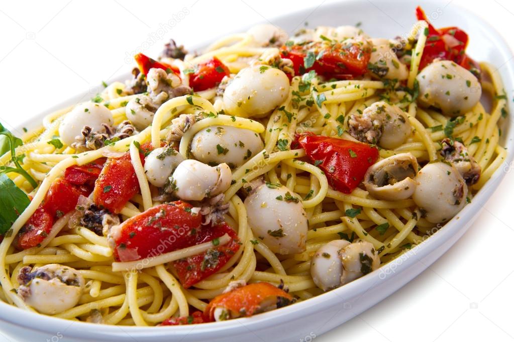 Spaghetti with cuttlefish and tomatoes Stock Photo by ©lsantilli 61660005