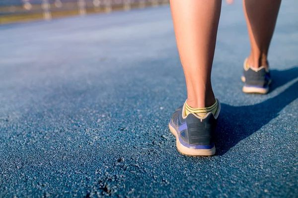 Runner Feet Running on Stadium Closeup - outdoor shot. - Stock Image ...