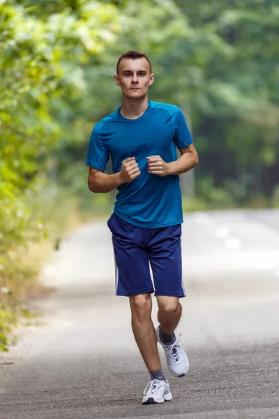 Man running on road — Stock Photo © Maridav #97354148