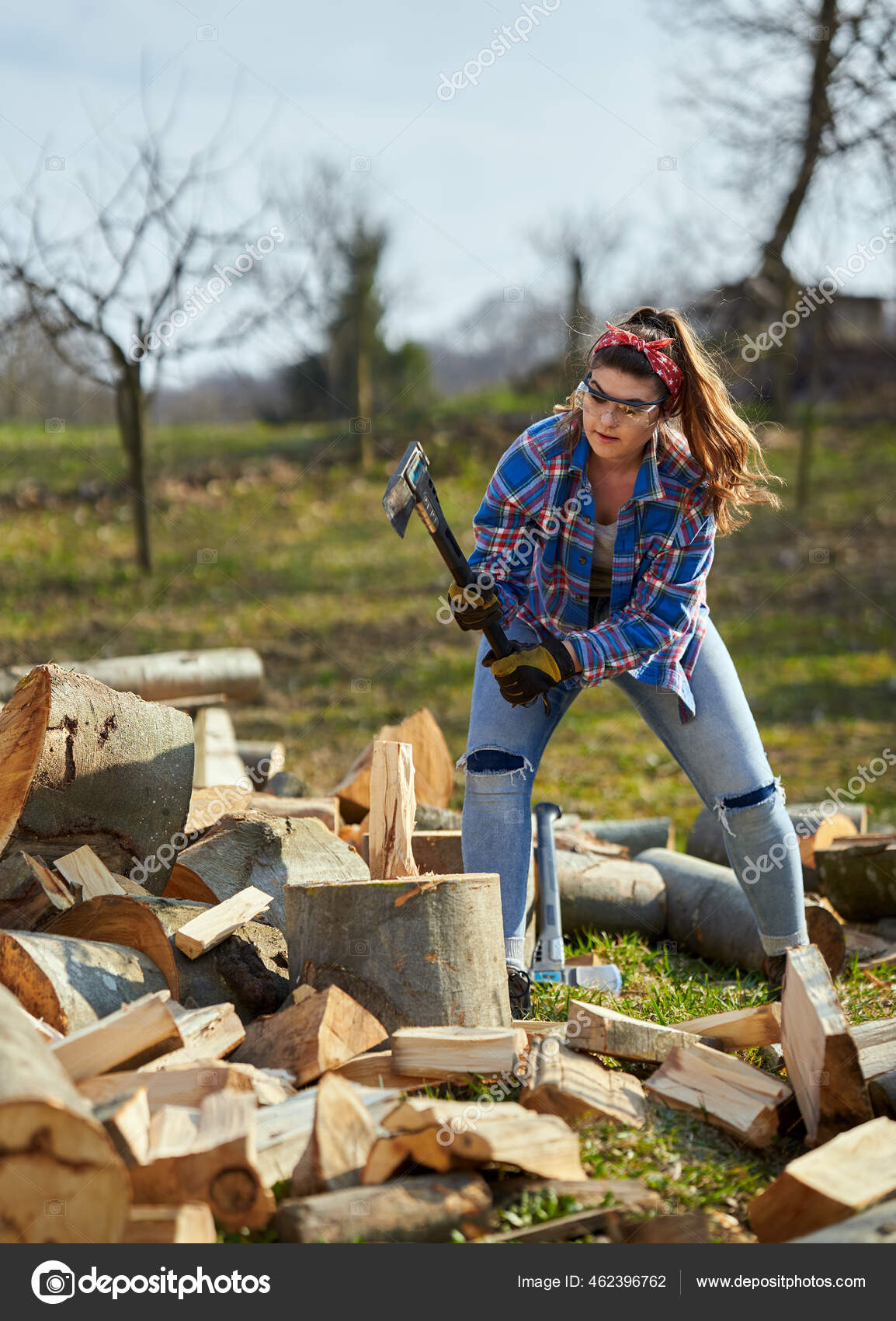 Woman Chopping Wood