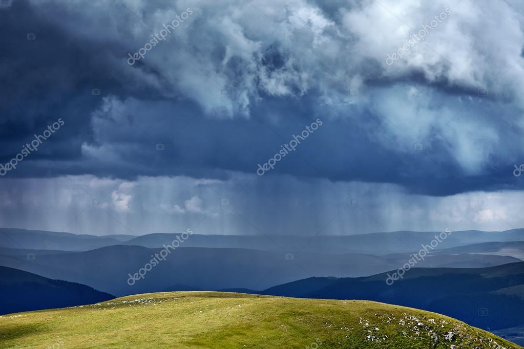 Heavy rain in mountains — Stock Photo © Xalanx #52371697