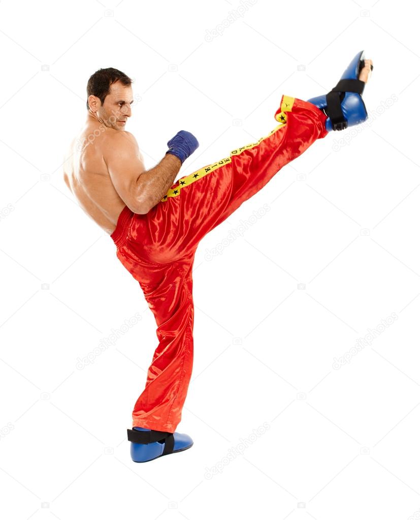 Kickbox fighter executing a kick — Stock Photo © Xalanx #52372259