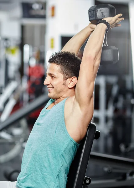 Athlete training in a gym - Stock Image - Everypixel
