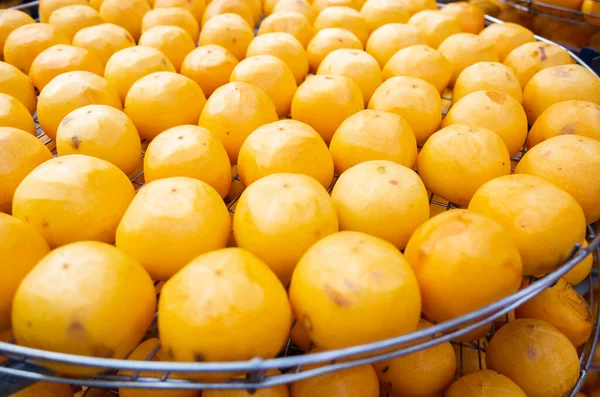 dried up persimmon under the sun in Xinpu township, Hsinchu, Taiwan ...