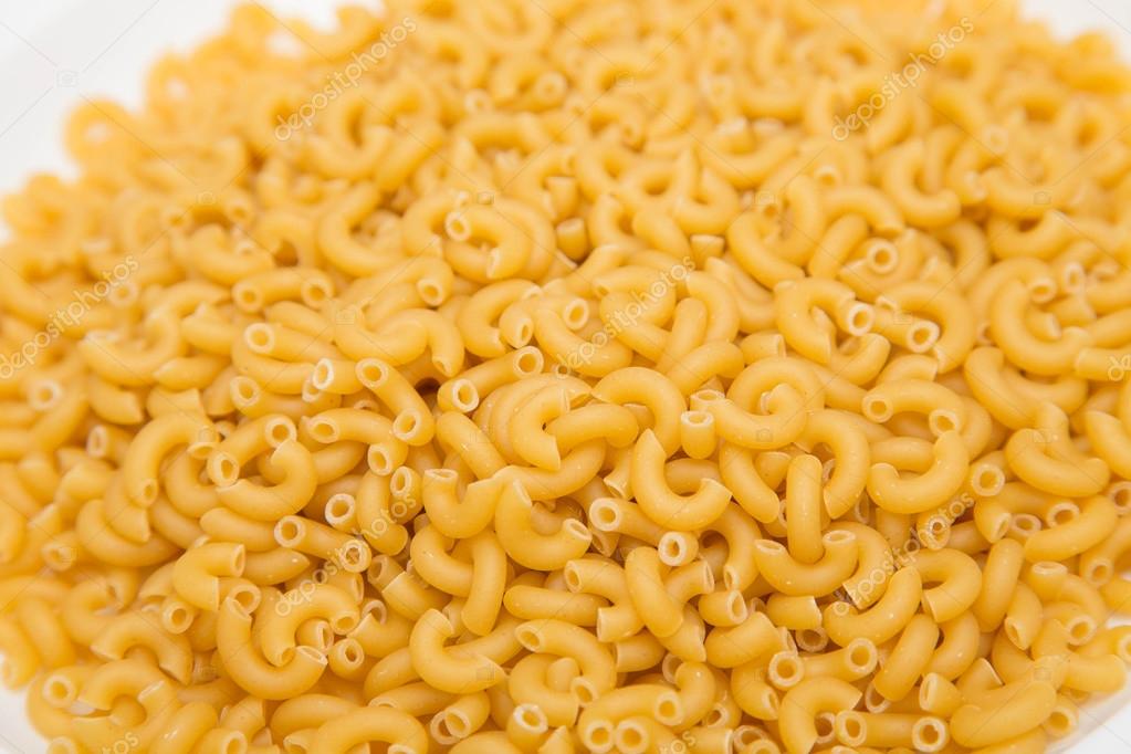 Elbow Macaroni on Counter — Stock Photo © dbvirago #66275287