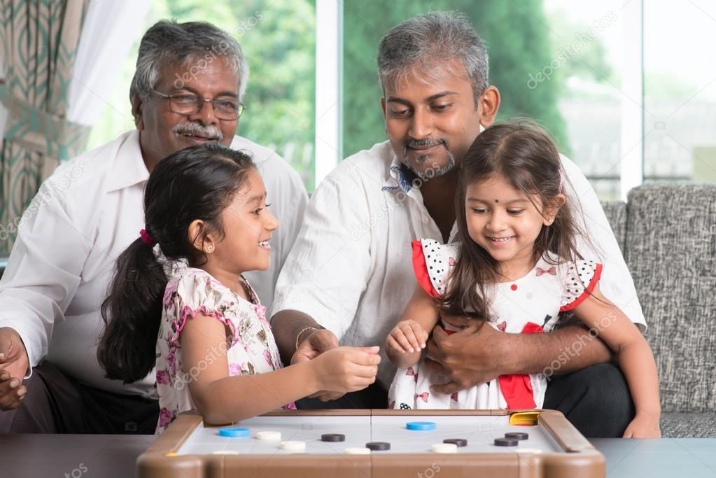 Multi generations family playing games together — Stock Photo © szefei ...
