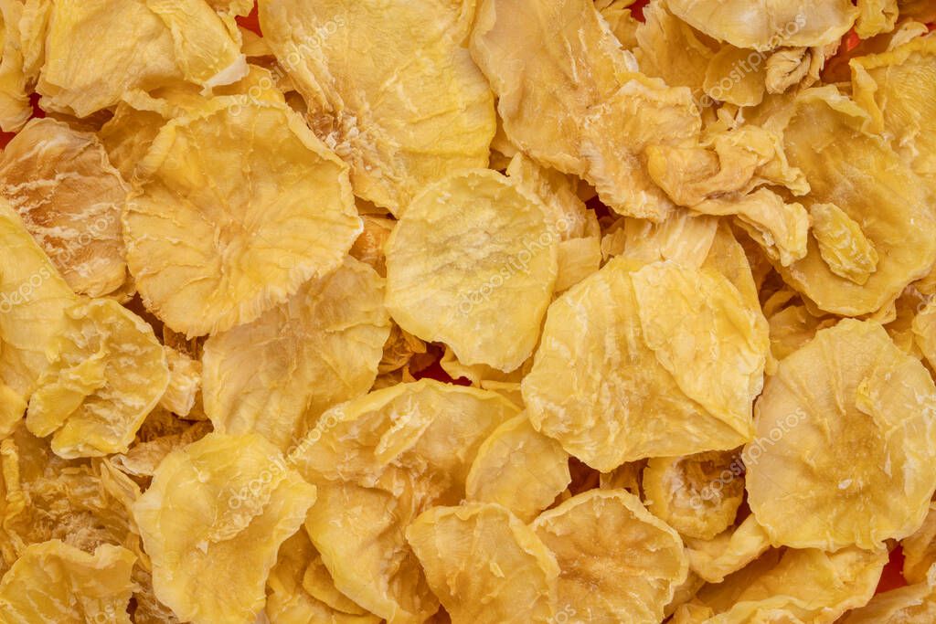 Fondo de rodajas secas de tubérculo de yacón. Yacon contiene inulina ...