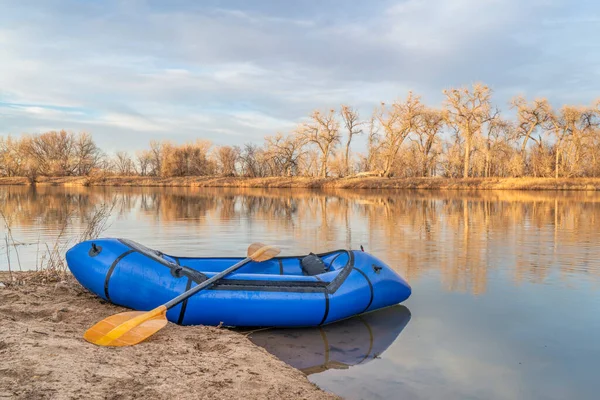 inflatable packraft (one-person light raft used for expedition or ...