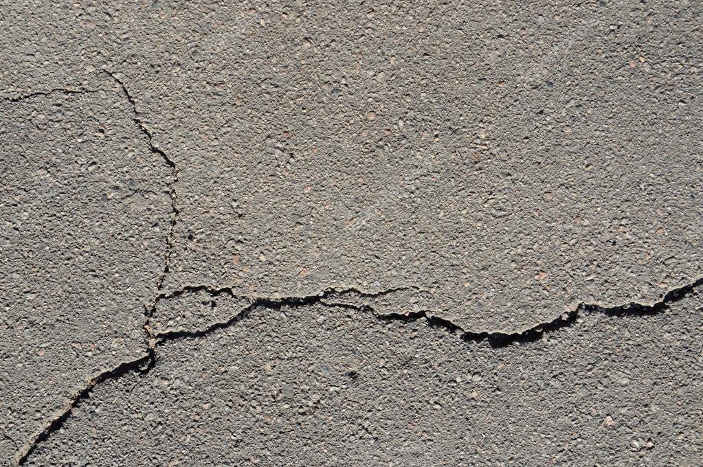 Asphalt cracked road texture Stock Photo by ©Marinka 85106628