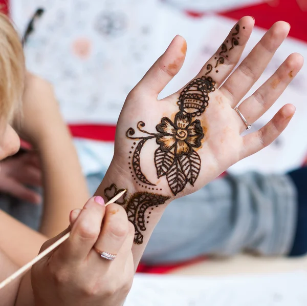 Master Applying Henna Female Hand — Stock Photo © Dinmy73 #277244220