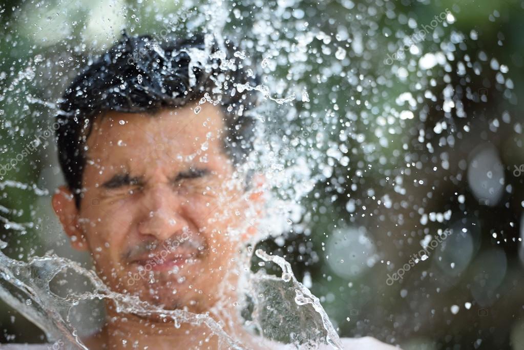 Boy splashed with water Stock Photo by ©dimarik 105503462