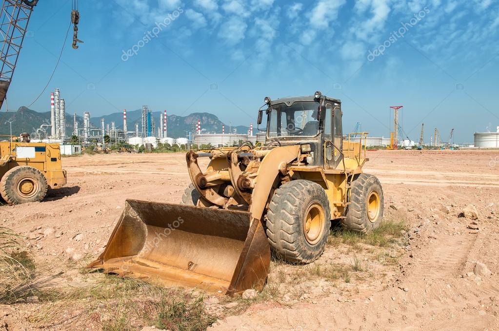 Bulldozer on a building site Stock Photo by ©firefox 100771512
