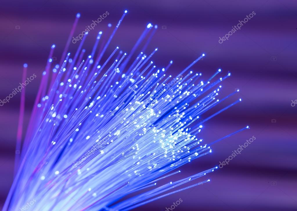 Optical fibres dinamic flying from deep on technology background ...