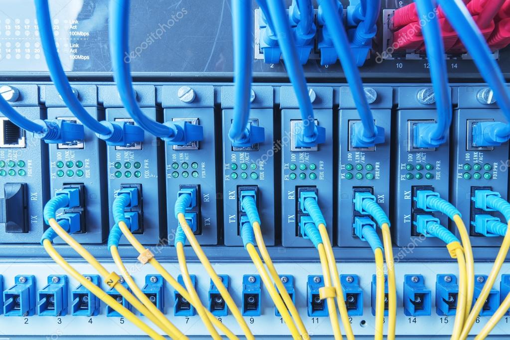 Fiber Optic cables connected to an optic ports — Stock Photo © firefox ...