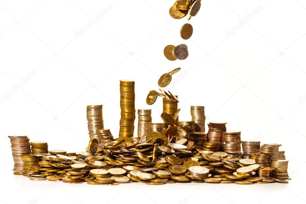 Coins falling into a pile — Stock Photo © mrakor #83809102