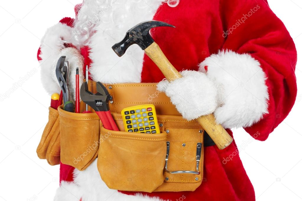 Santa Claus with a tool belt. — Stock Photo © petrkurgan #59657207