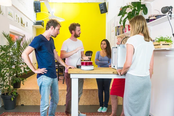 3D Designers Discussing At Desk — Stock Photo © Corepics #80395208