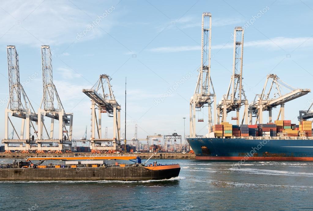 Container ships in a commercial port — Stock Photo © Corepics #82957596