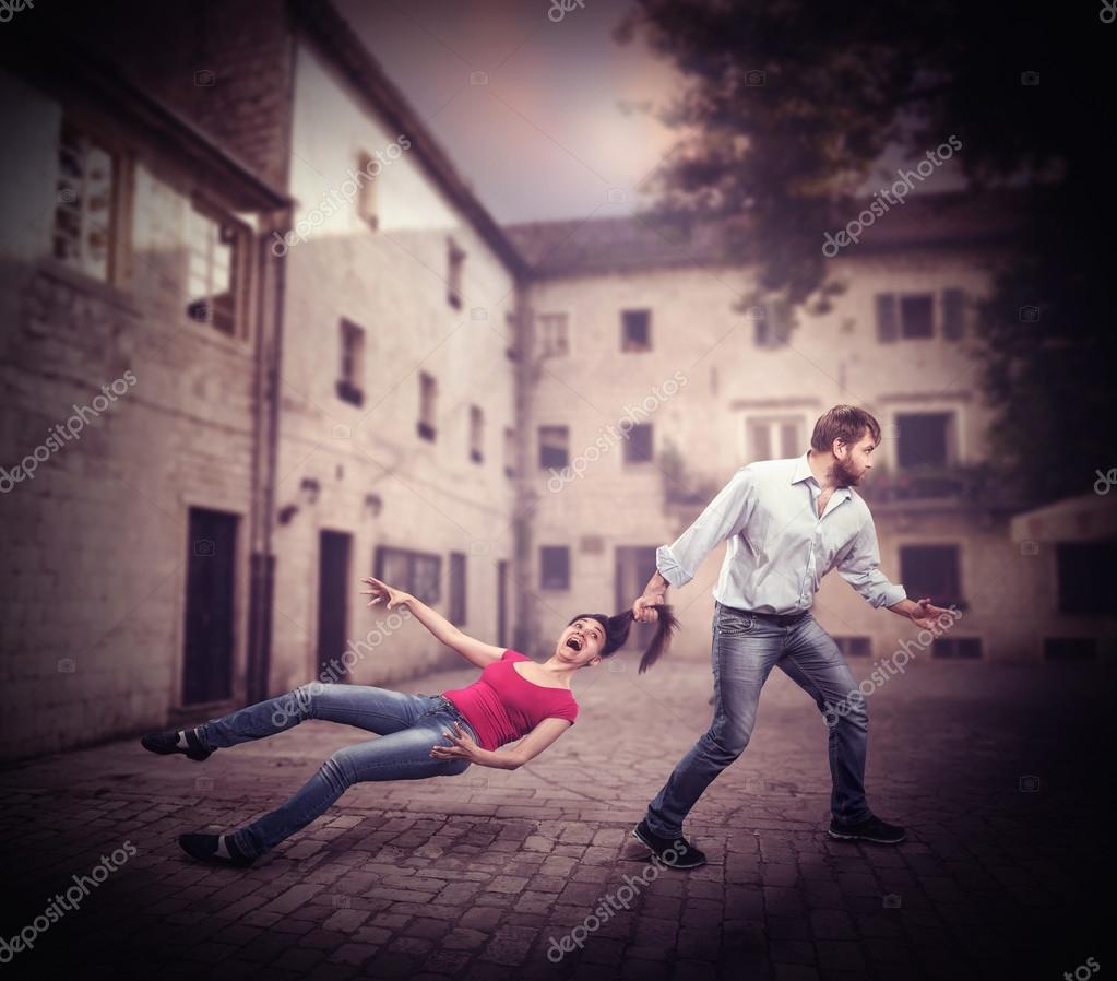 Man pulling woman by the hair — Stock Photo © Nomadsoul1 #117755106