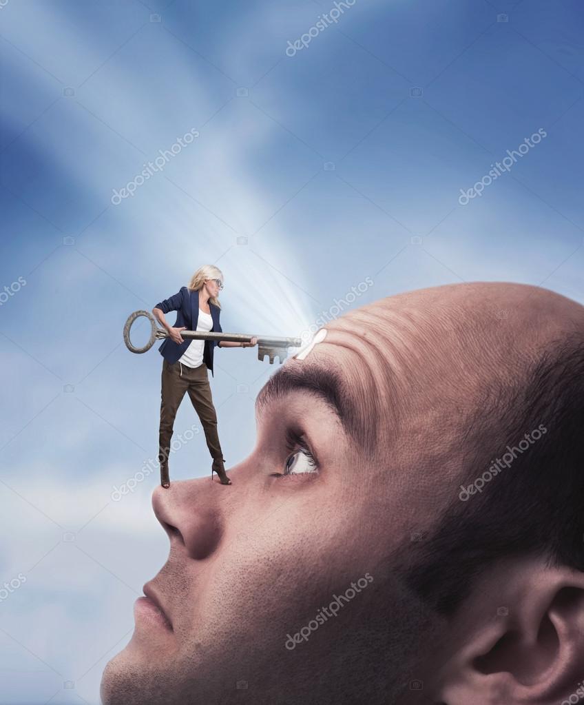 Woman with key on man's face — Stock Photo © Nomadsoul1 #90110124