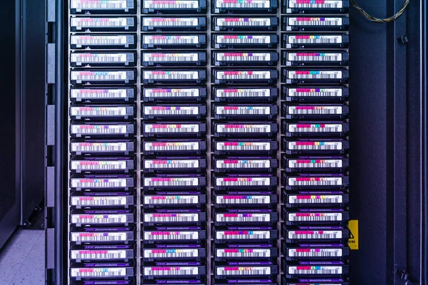 robotic data archive center with large amount of magnetic tapes - Stock Image - Everypixel