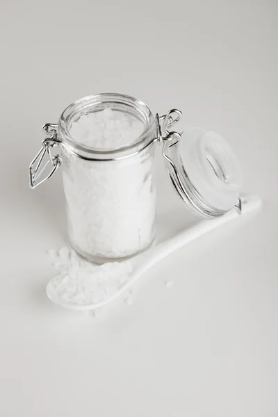 Salt in glass container Stock Photo by ©gdolgikh 118391748