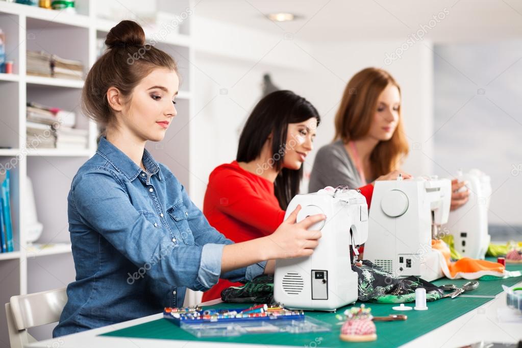 Women in a sewing workshop — Stock Photo © gdolgikh #96133030