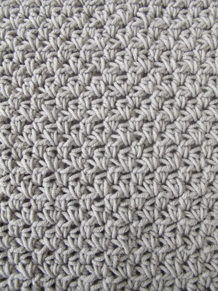 Crochet pattern background in grey — Stock Photo © HeikeRau #61907655