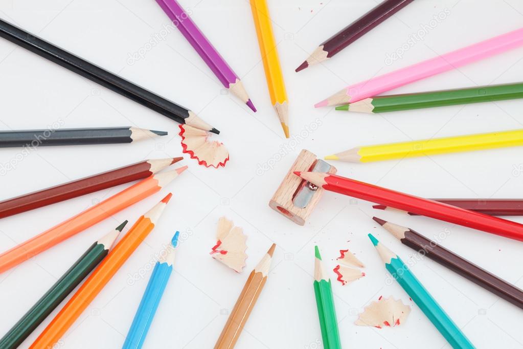 Colored pencils and sharpener Stock Photo by ©melektaus 118934150