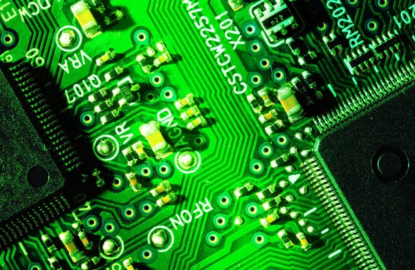 macro photography of a computer electronic chip on a microcircui ...