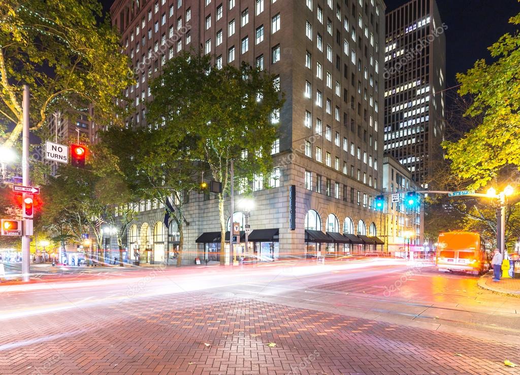 Intersection of brick road and modern buildings — Stock Photo ...