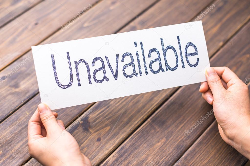 Hands holds paper with word unavailable Stock Photo by ©zhudifeng 115913324