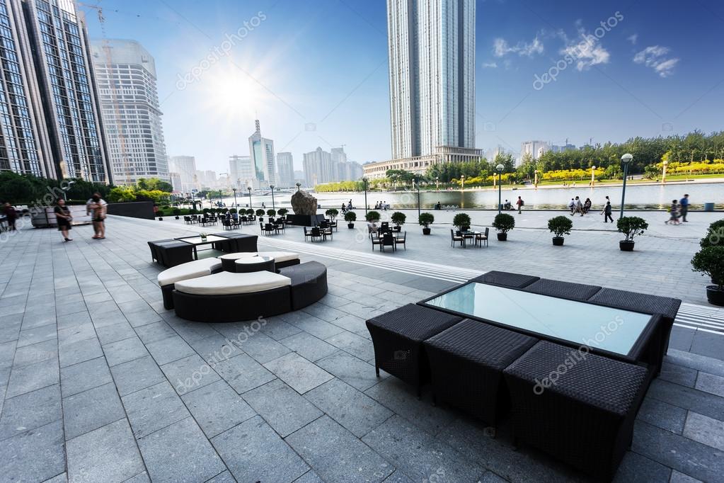Modern buildings and public square with seats Stock Photo by ©zhudifeng ...
