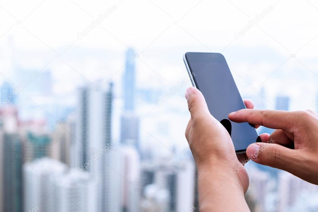Hand holding mobile phone — Stock Photo © zhudifeng #78575070