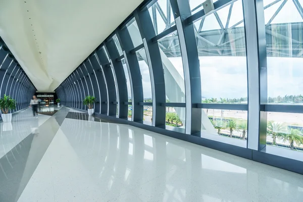 Corridor with glass windows in shopping mall Stock Photo by ©zhudifeng ...