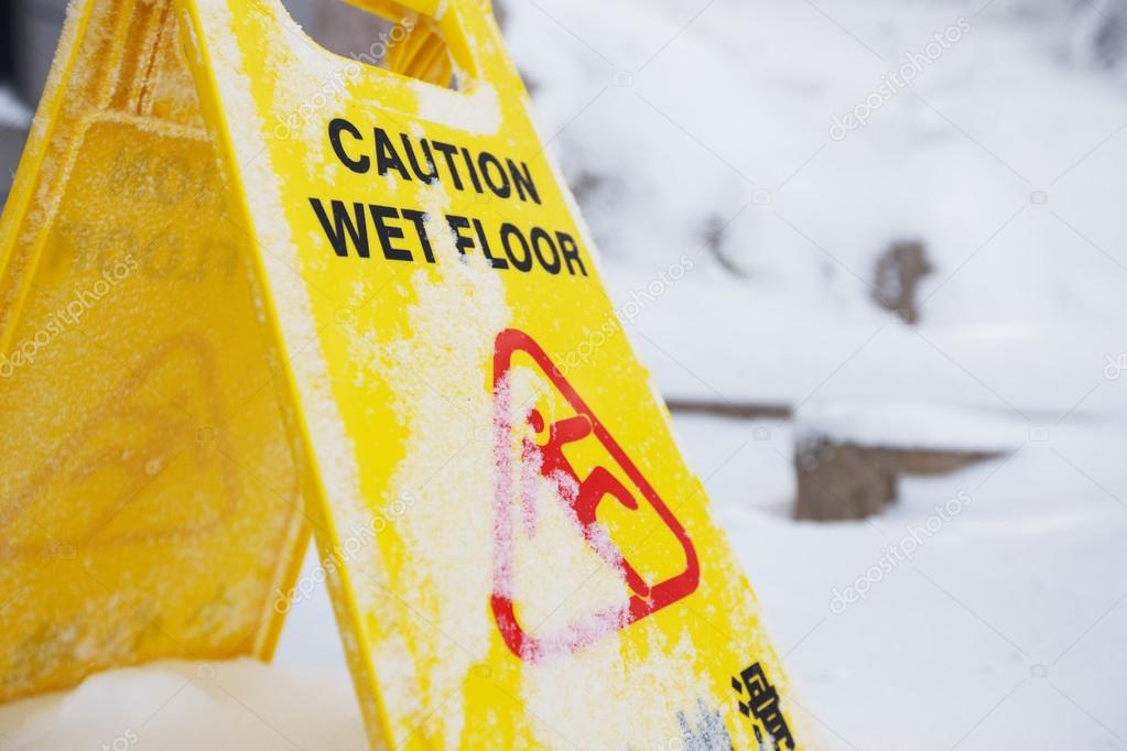 Warning caution sign board on snow floor — Stock Photo © zhudifeng ...