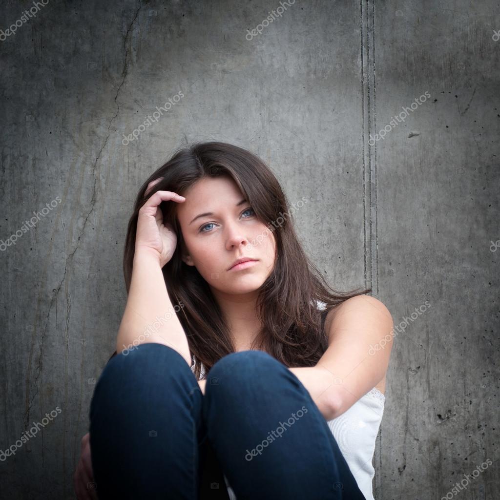 Teenage girl looking thoughtful about troubles Stock Photo by ...