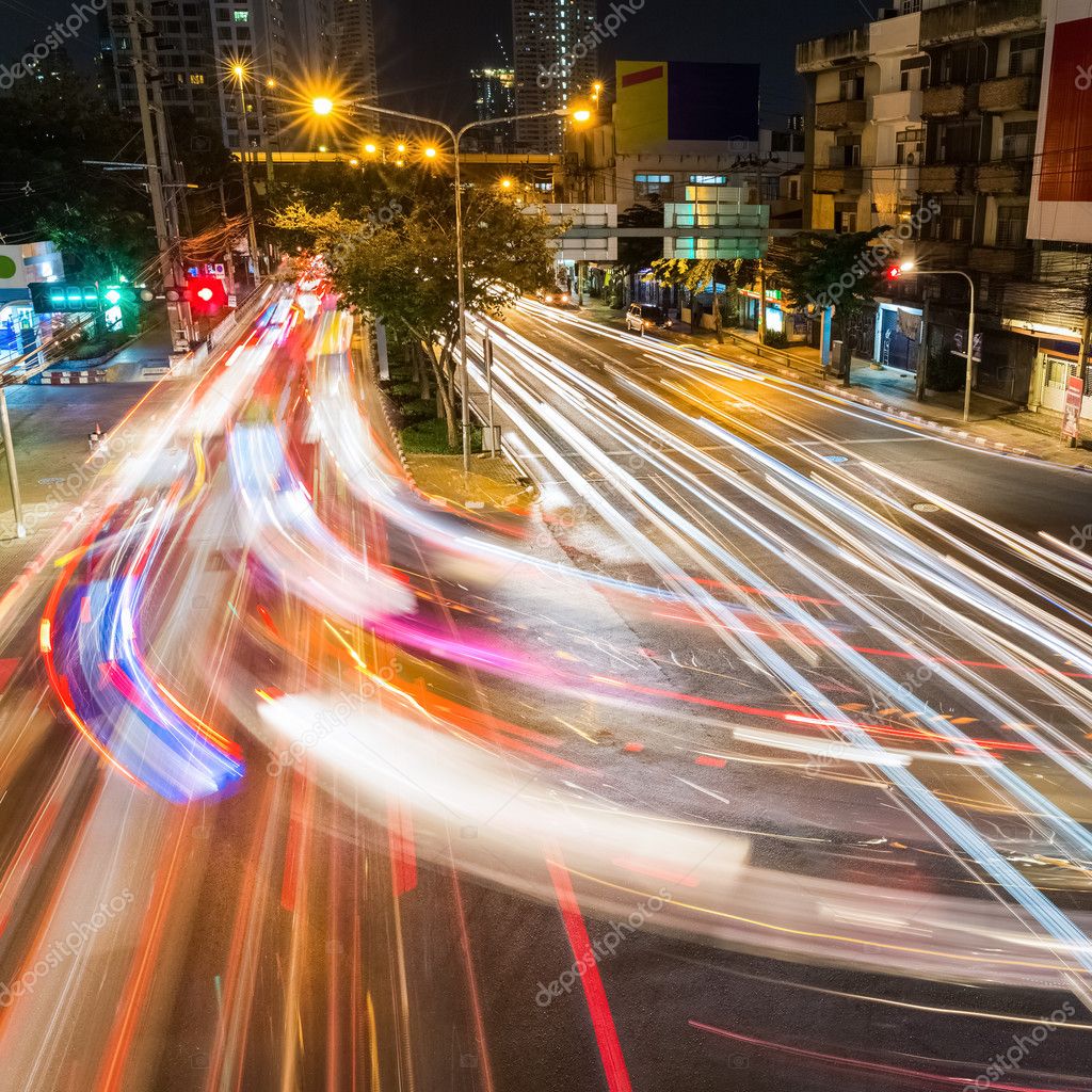 Light trails on the road Stock Photo by ©chungking 102178352