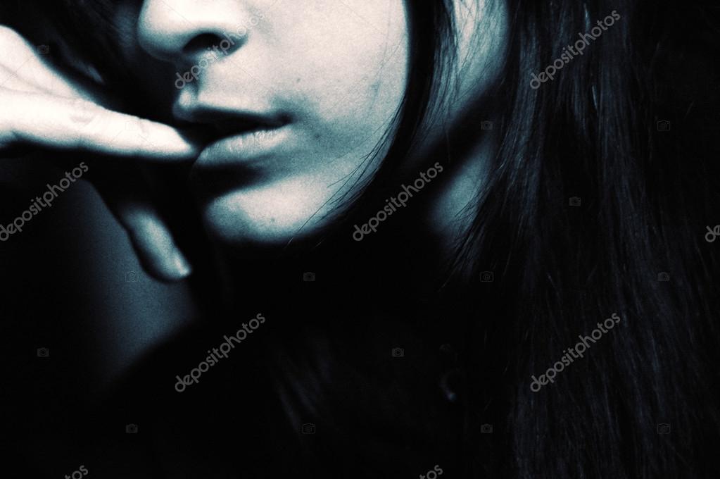 Woman biting finger Stock Photo by ©j0ycem 53758879