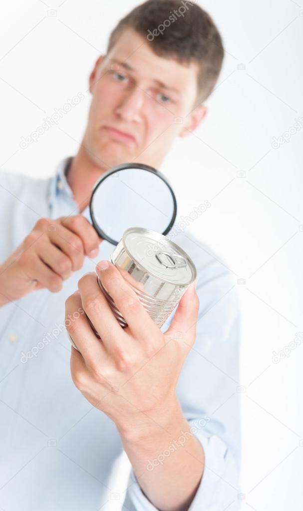 Man inspecting nutrition label — Stock Photo © franckito #66266823