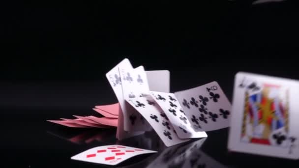 Playing cards falling on black background slow motion — Stock Video ...