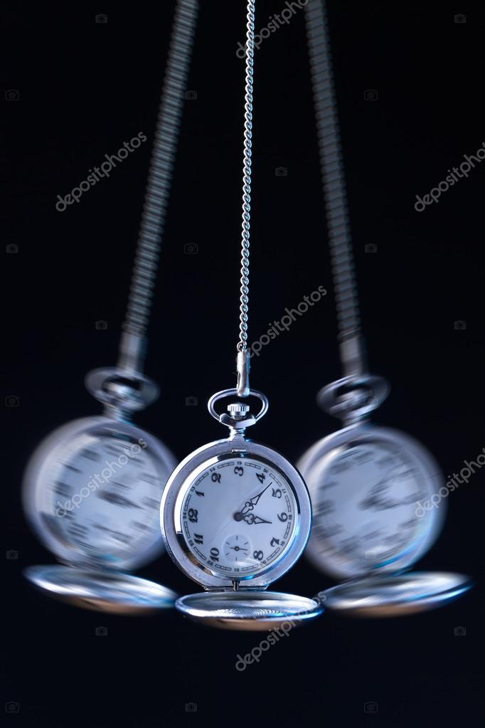 Pocket watch swinging on a chain to hypnotise Stock Photo by ©igorr1 ...